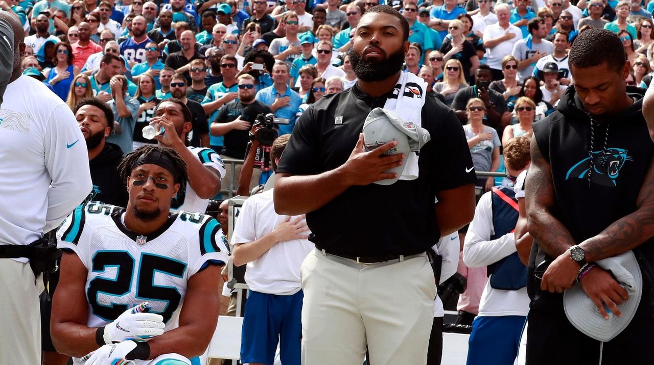 Panthers' Eric Reid returns, kneels during national anthem - Newsday