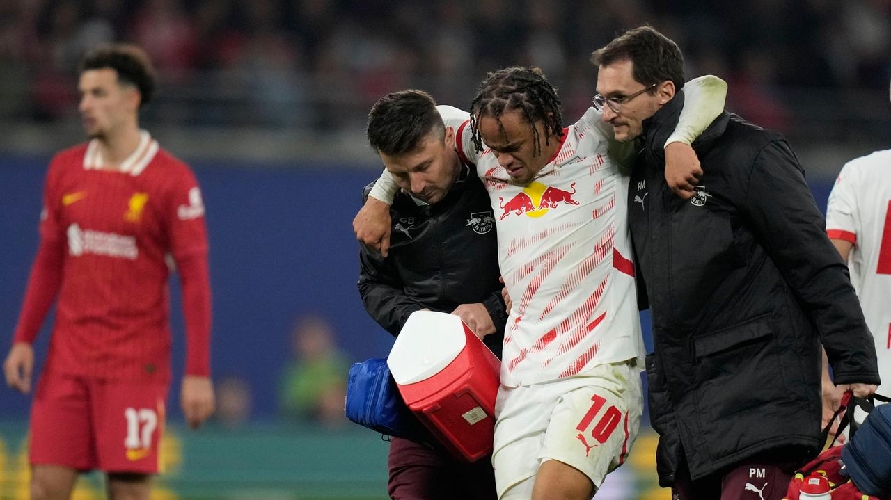 Leipzig's Xavi Simons helped off the field with injury in Champions ...