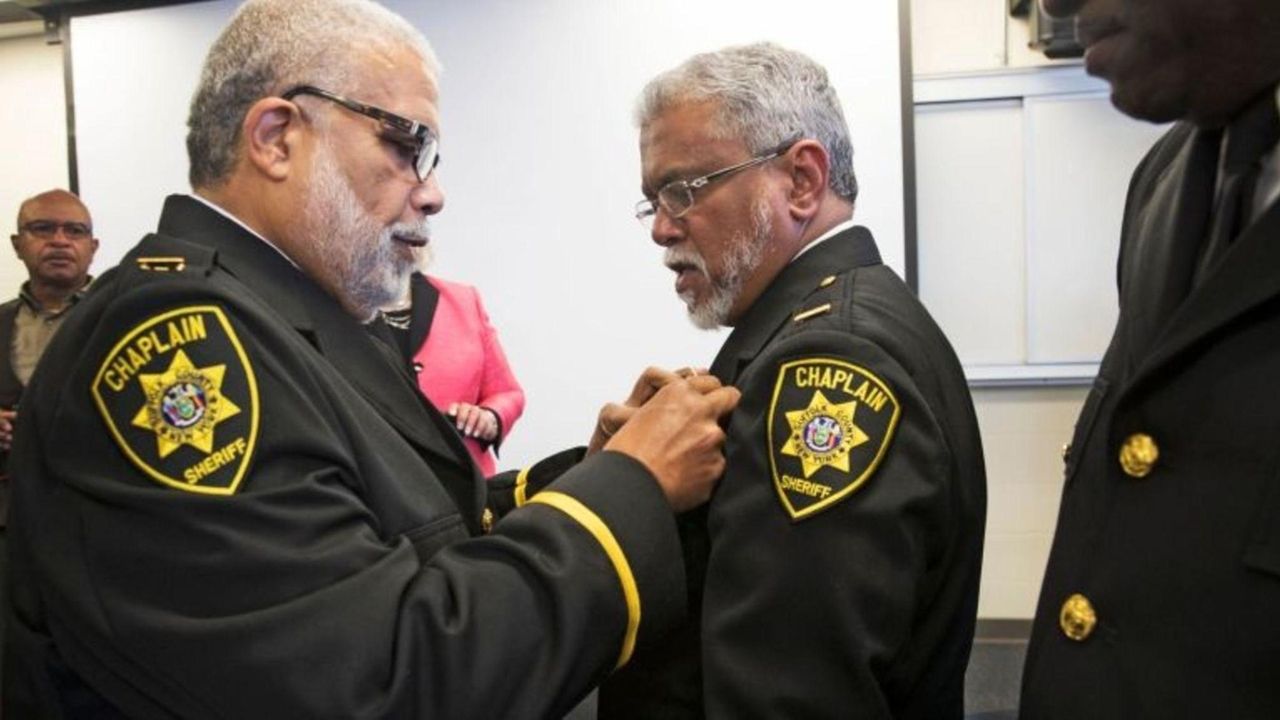 Suffolk sheriff’s office swears in 8 chaplains to help employees - Newsday