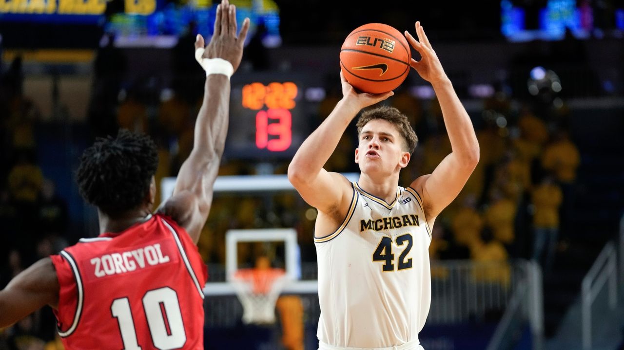 Tschetter and Nkamhoua combine for 15-of-15 shooting as Michigan beats ...