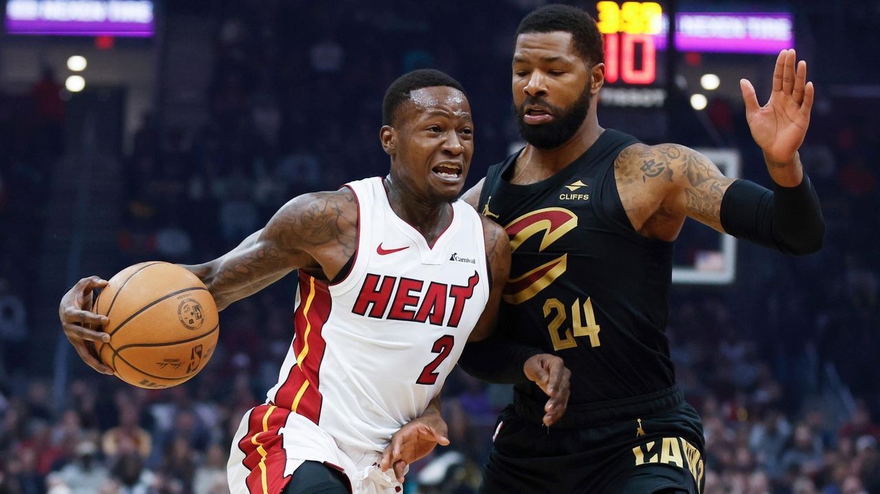 Terry Rozier's go-ahead 3-pointer with 14.5 seconds left helps the Heat beat the Cavaliers 107 ...