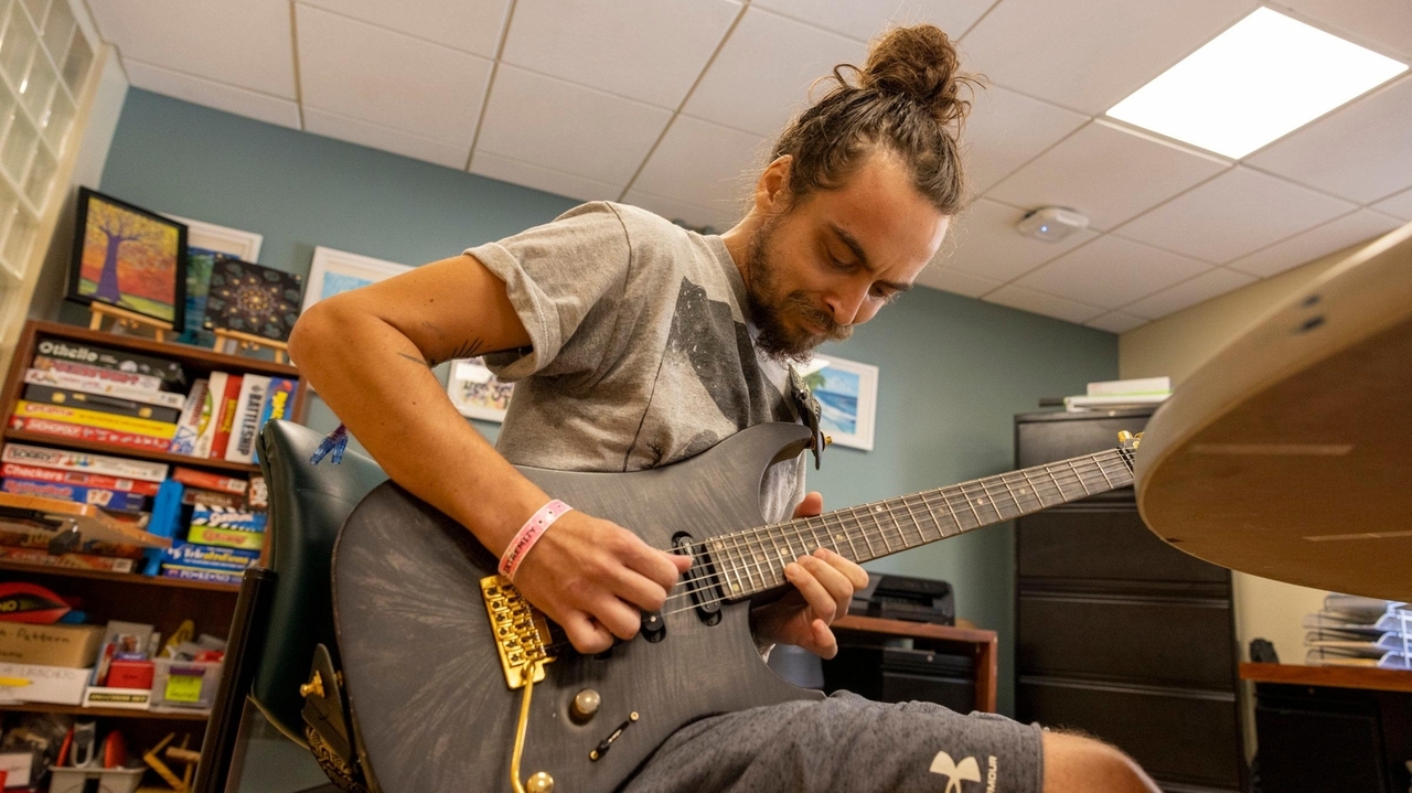 Moon Tooth guitarist Nick Lee emerges from induced coma, looking ...