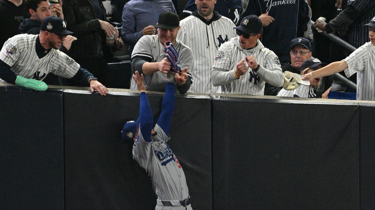 World Series: Yankees fans ejected after prying ball from Mookie Betts' glove - Newsday