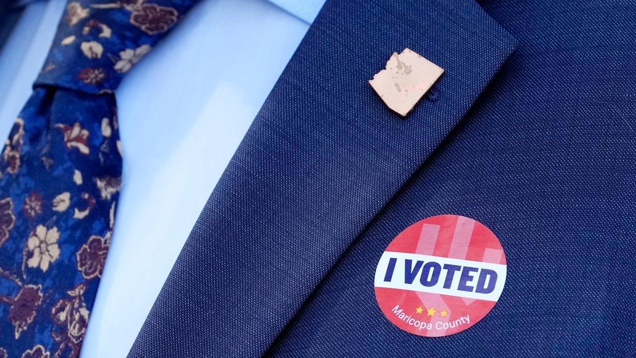 Early in-person voting begins in Arizona, drawing visits from Harris ...