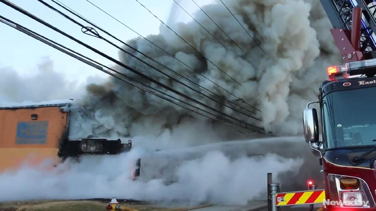 Officials: Fire engulfs, damages Centereach building - Newsday