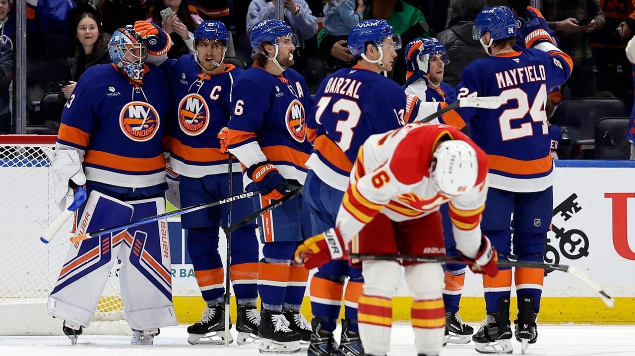 Islanders' Simon Holmstrom scores twice in win over Flames at UBS Arena ...