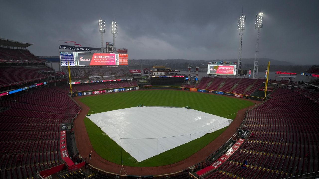 Reds-Brewers game washed out by heavy rain in Cincy, rescheduled for ...