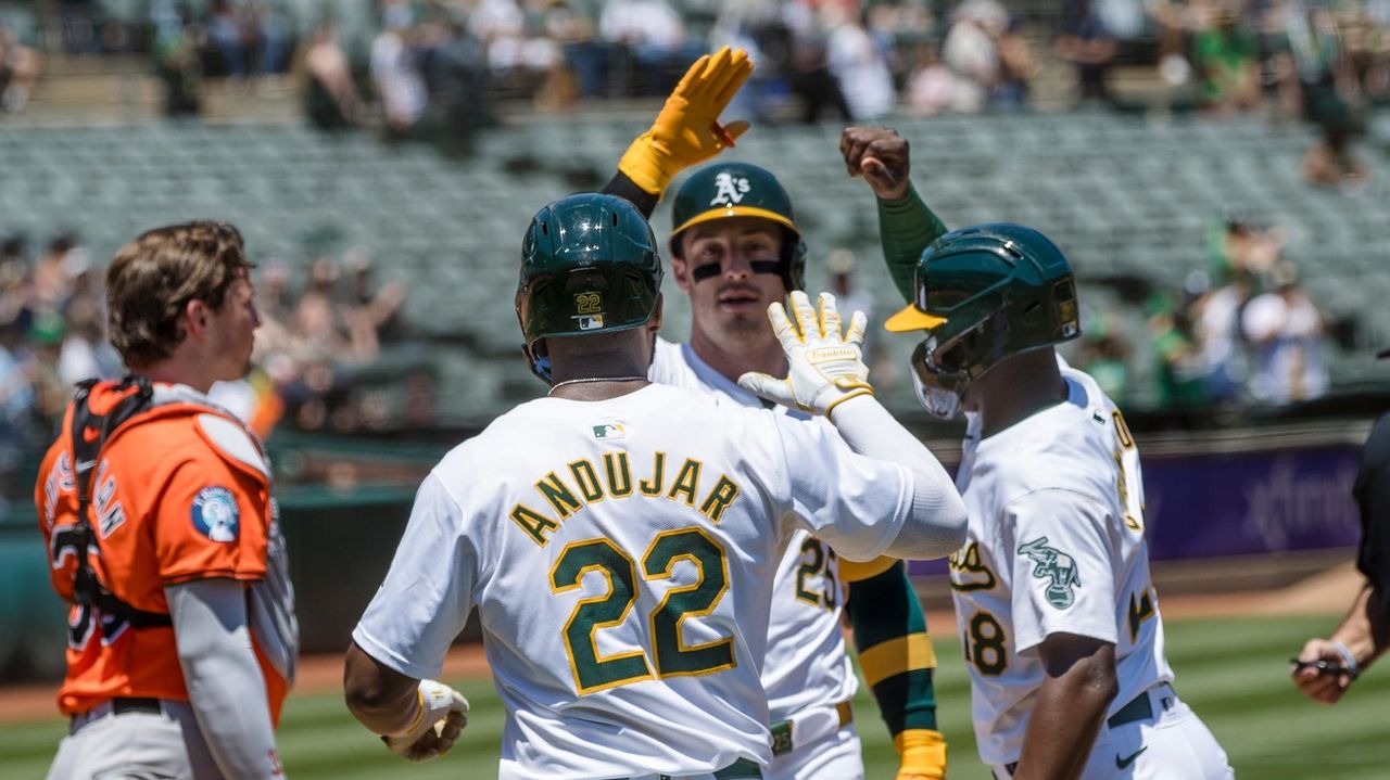 Rooker, Schuemann hit 3-run homers in Athletics' 19-8 rout of Orioles ...