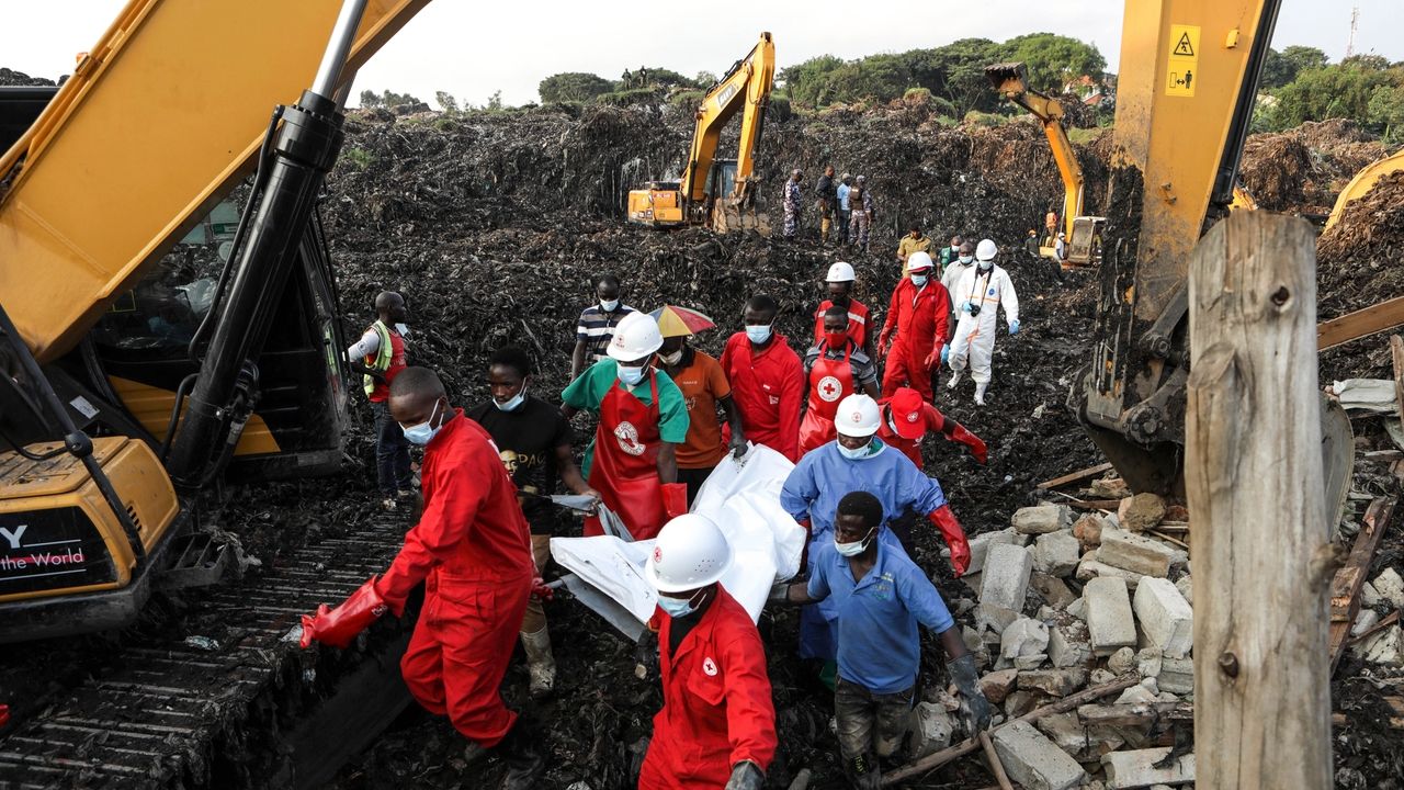 Death toll in Uganda rubbish heap collapse reaches 24 as rescue teams ...