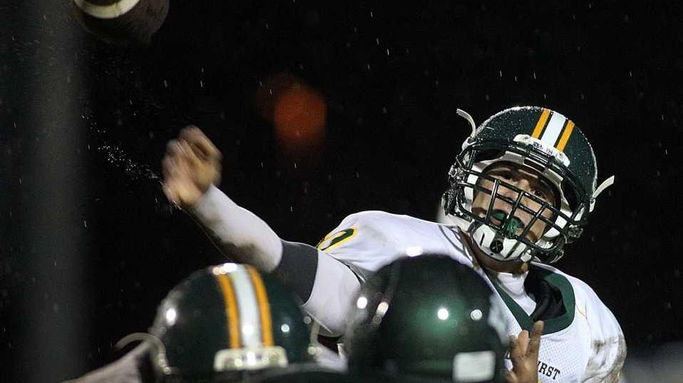 Floyd holds off Skon, Lindenhurst in the mud - Newsday