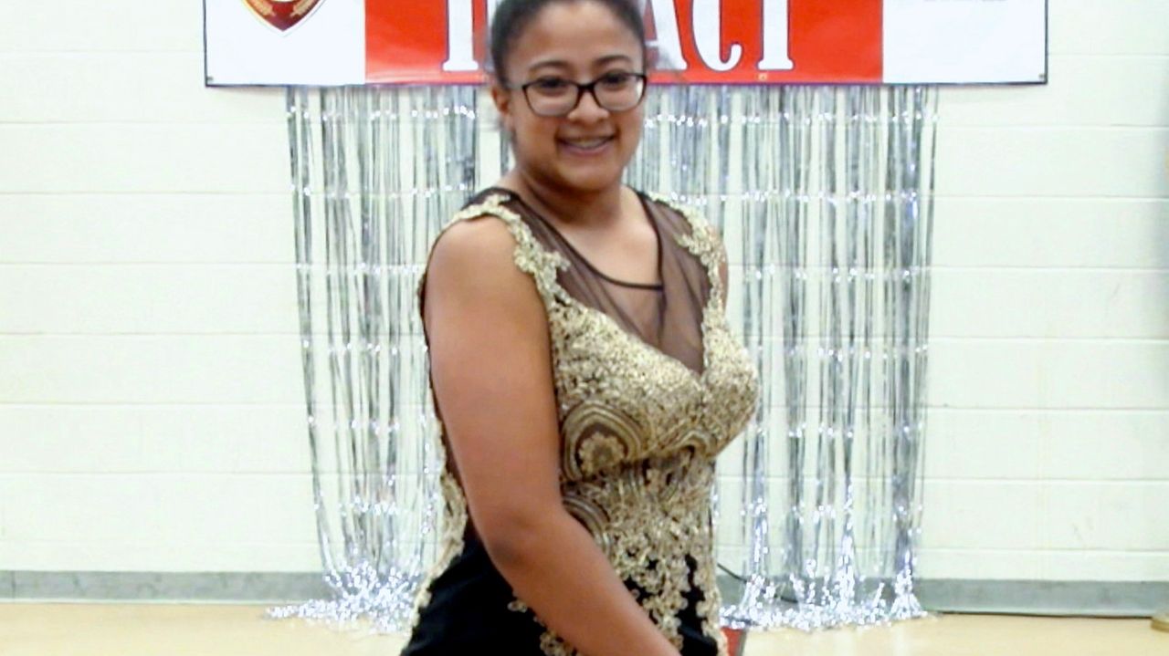 Prom-goers select their formal wear at Suffolk police giveaway event ...