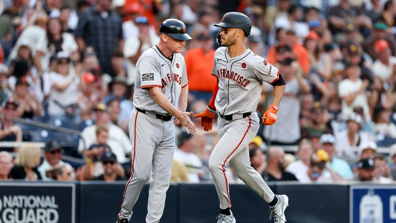 Rookie outfielder McCray homers twice and drives in 5 runs as the ...