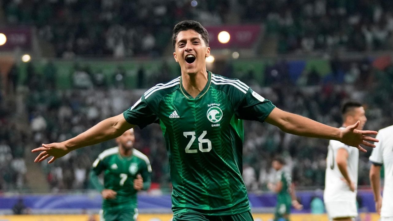Saudi Arabia beats 9-man Kyrgyzstan 2-0 to advance to the knockout ...