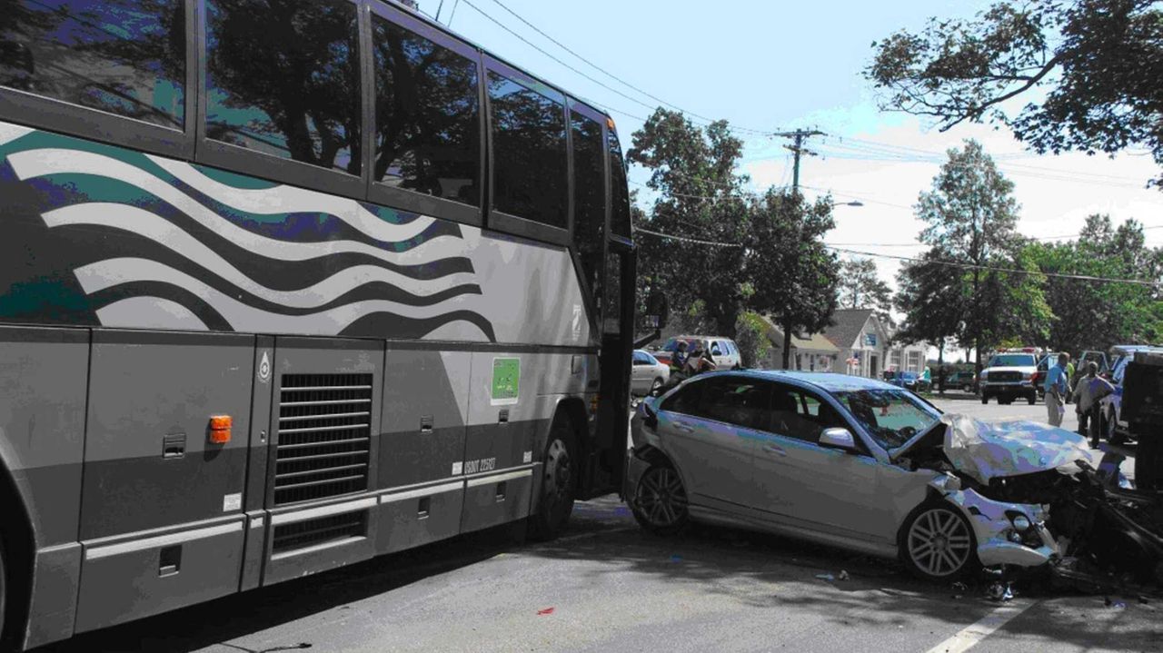 Cops: Hampton Jitney driver distracted before crash - Newsday