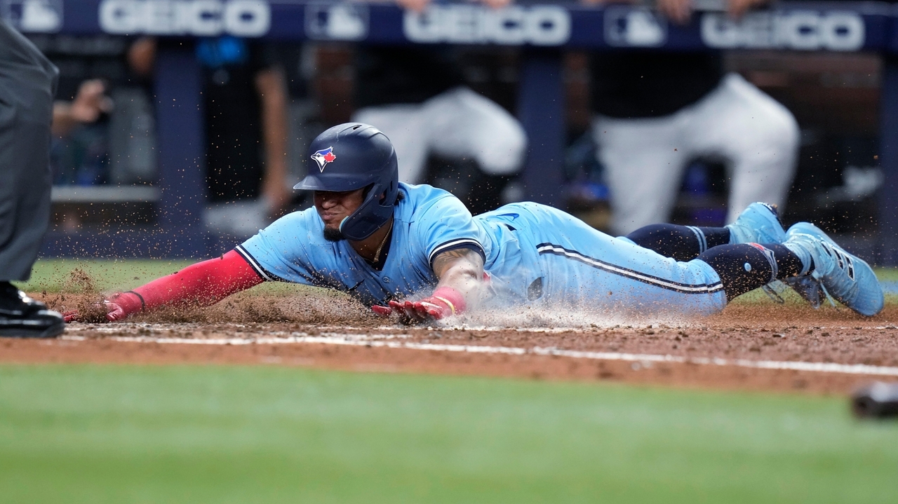 Clement and Springer hit RBI singles in the 8th in the Blue Jays' 2-0 ...