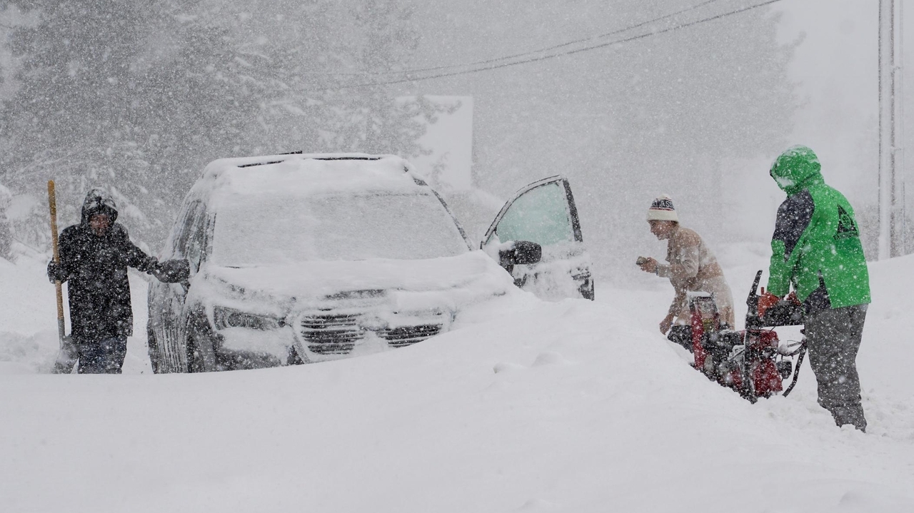 A massive blizzard howls in the Sierra Nevada. High winds and heavy ...