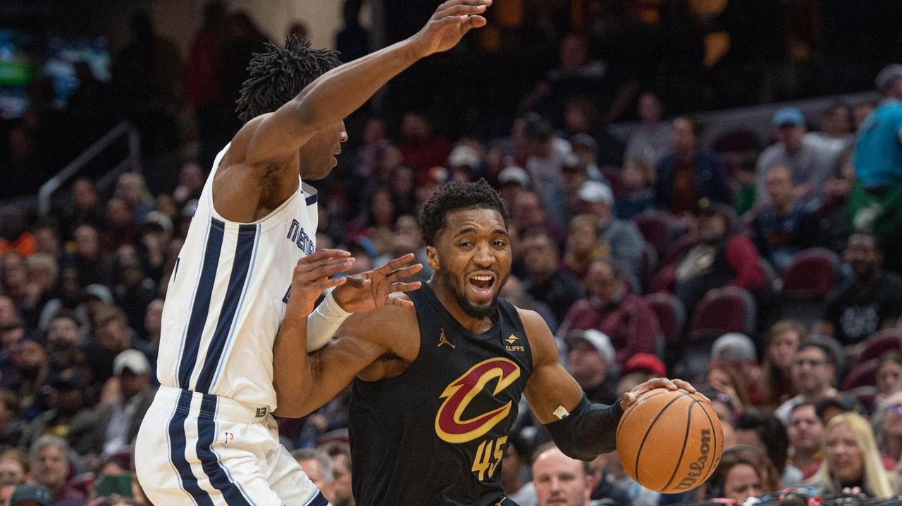 Donovan Mitchell scores 29 points, Cavaliers beat Grizzlies 110-98 to close in on playoff berth ...