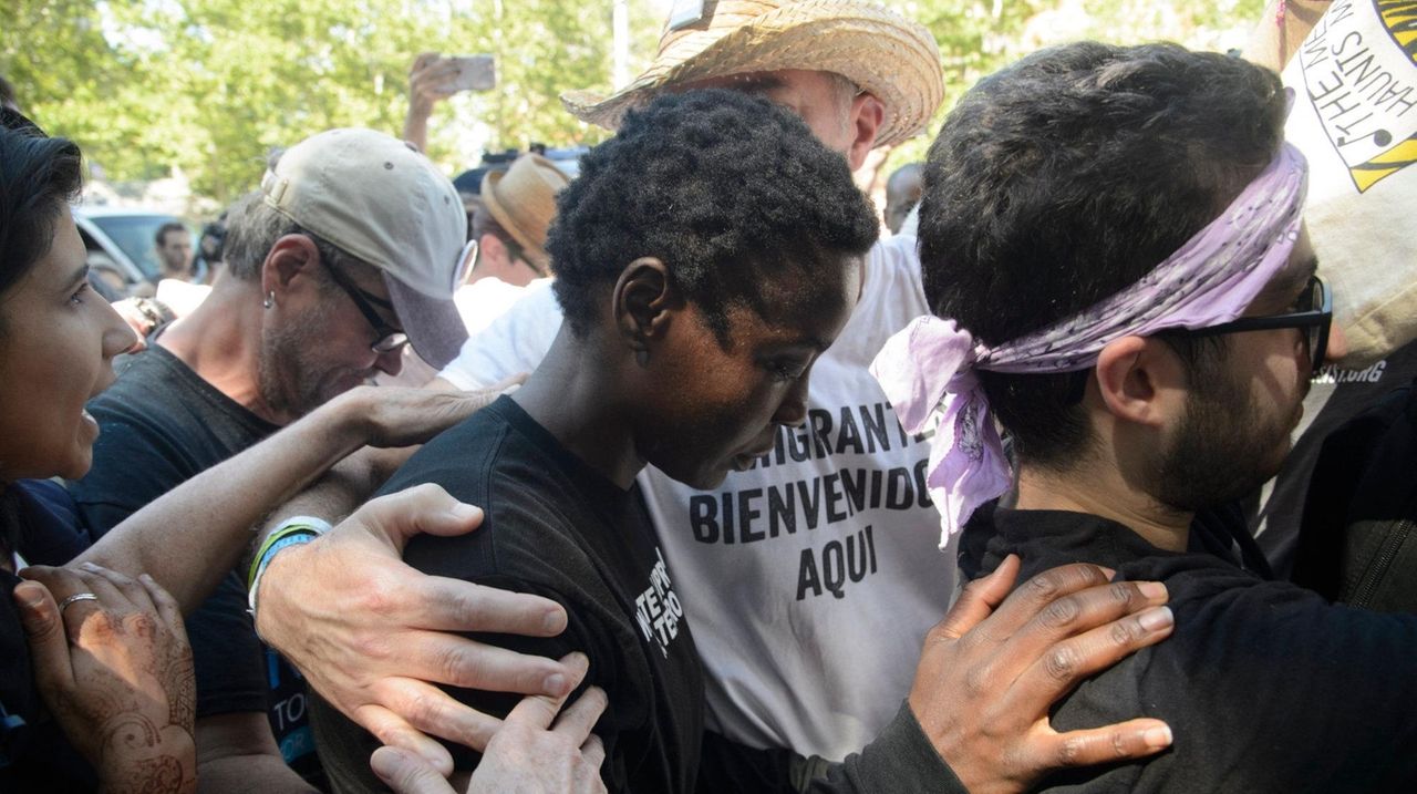 Woman who scaled Lady Liberty pedestal strikes defiant tone after ...