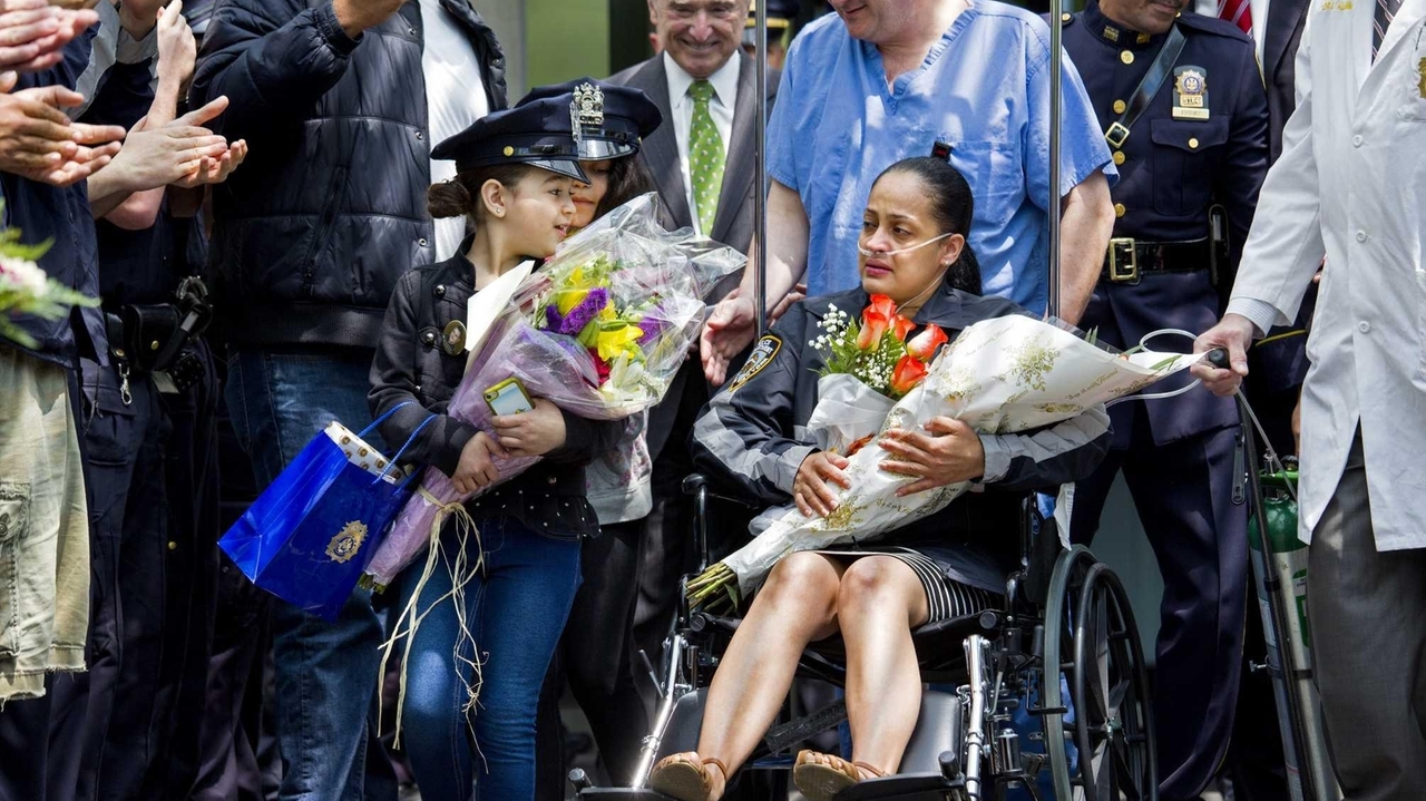 Injured NYPD Officer Rosa Rodriguez leaves hospital - Newsday