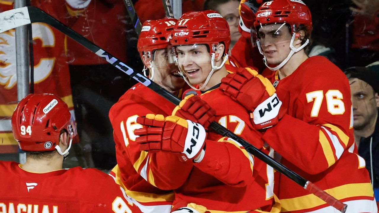 Flames beat Minnesota 4-2 to prevent the Wild from clinching a playoff ...