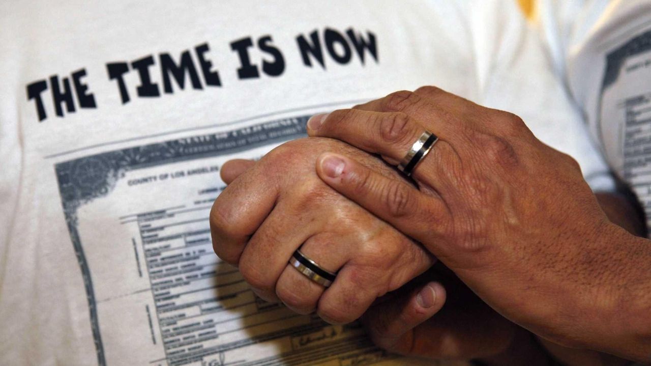 Clinton: Overturn Defense of Marriage Act - Newsday