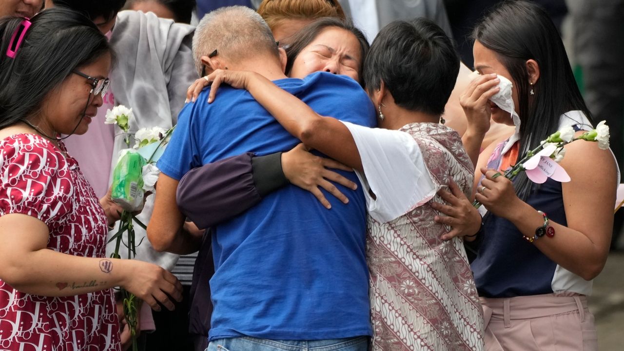Filipina who won a last-minute reprieve from an Indonesian firing squad returns home - Newsday
