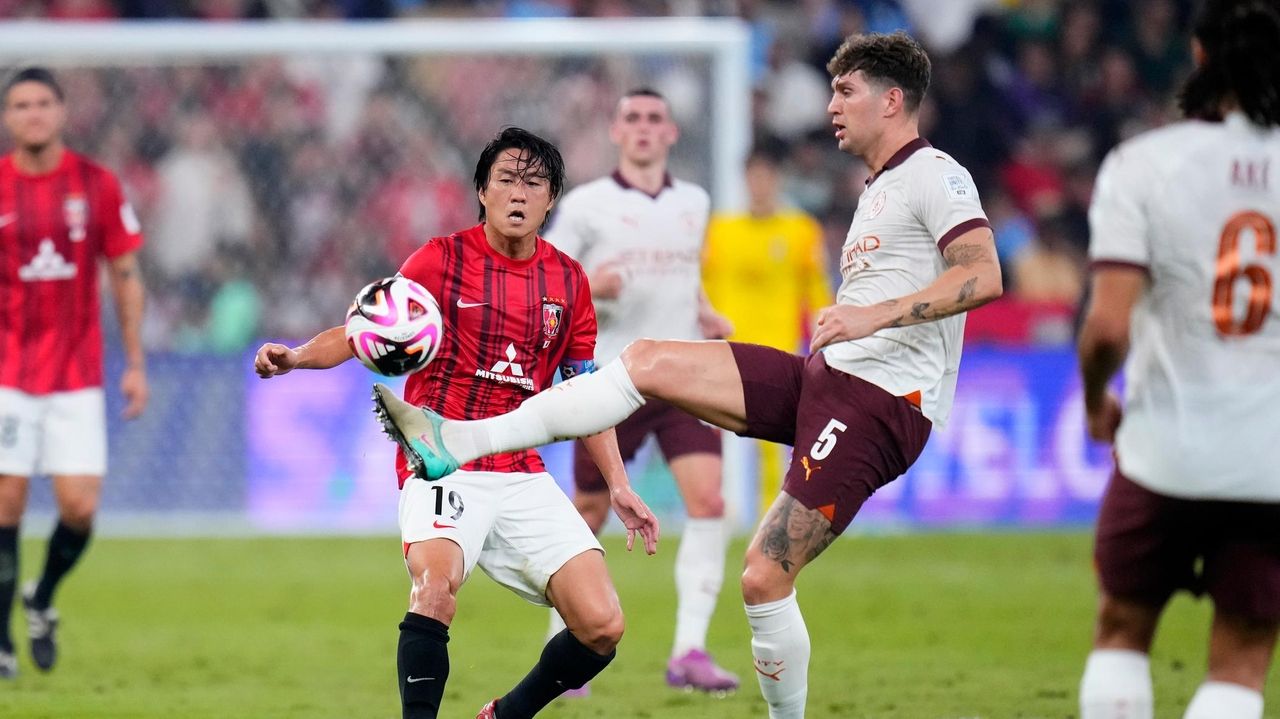 Soccer player Stones, F1 driver Albon invest in team from Woods and ...