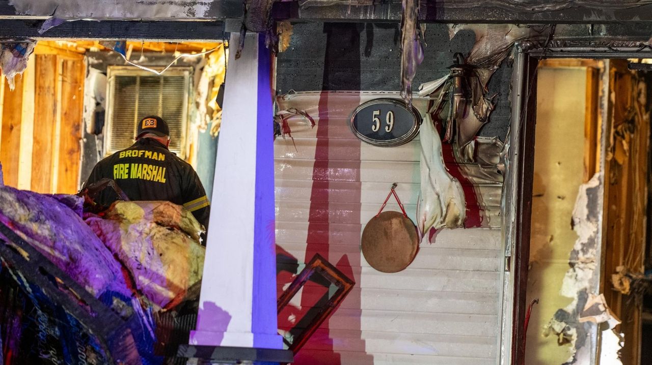 Two dogs rescued from Central Islip house fire - Newsday