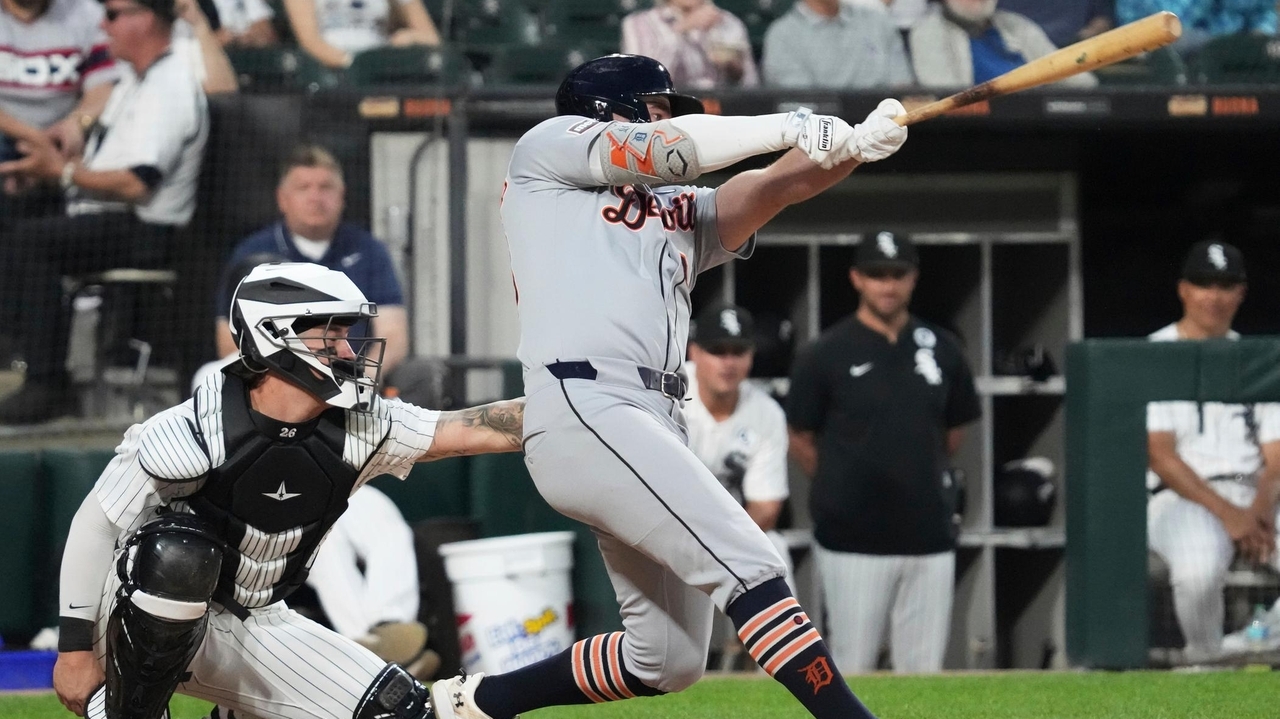 Carpenter hits 3 homers as the Tigers reach 40 wins by pounding the ...