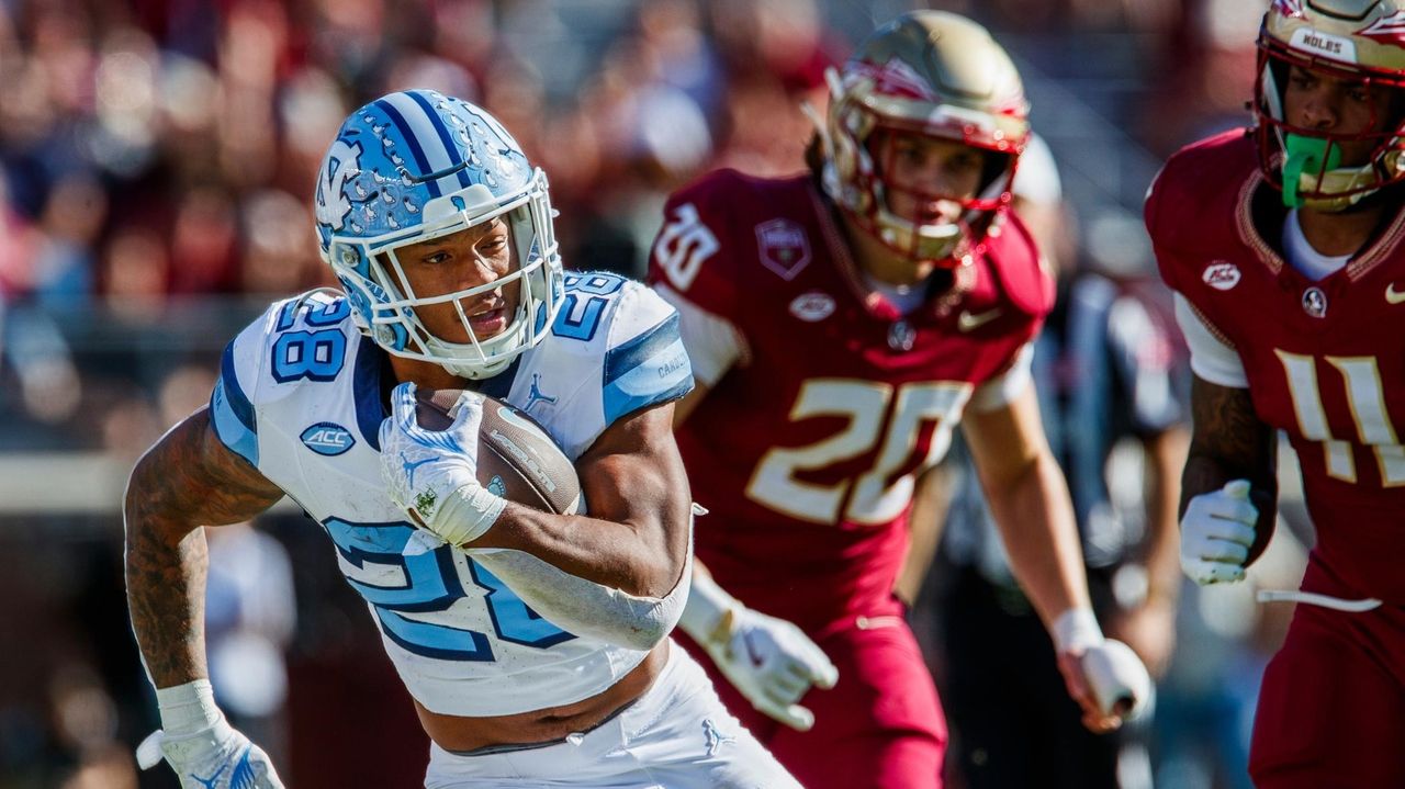 Los Angeles Chargers choose North Carolina RB Omarion Hampton in effort ...