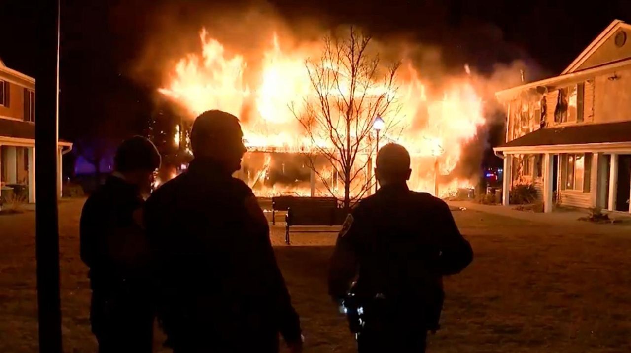 One dead as fire consumes apartment building in Coram complex - Newsday