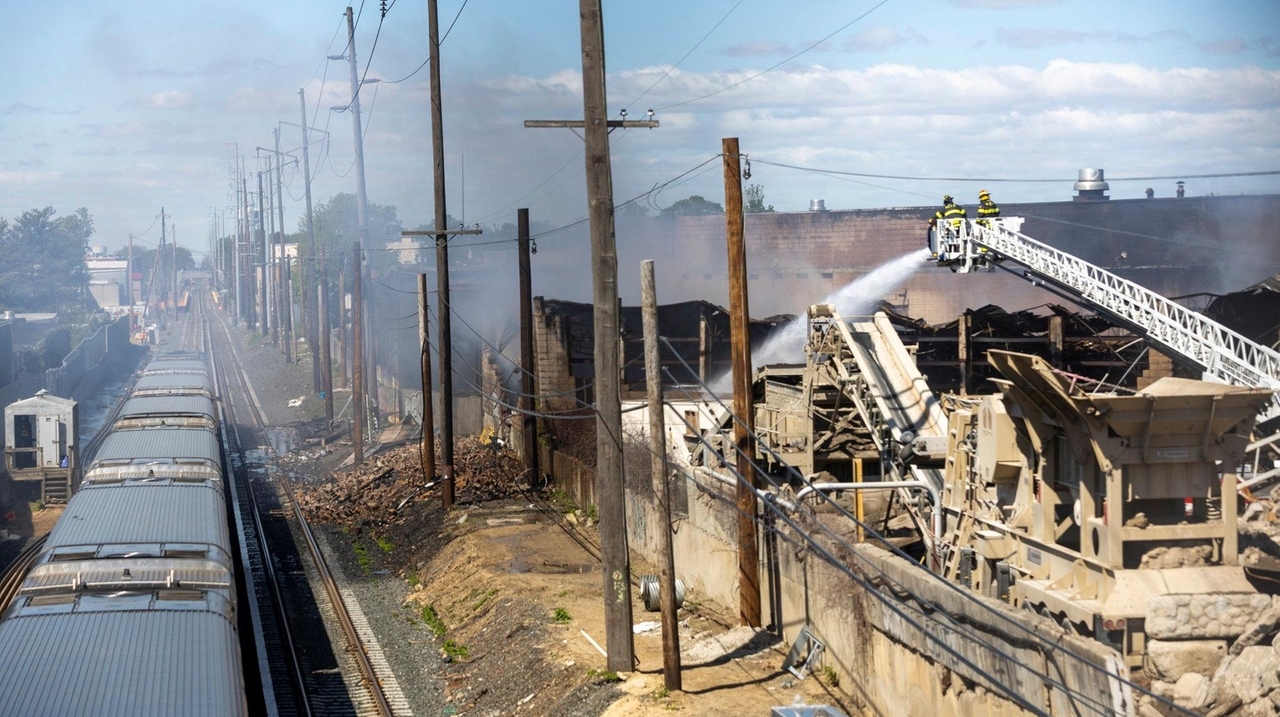 Firefighters withdrawn from site of massive Westbury fire, official ...