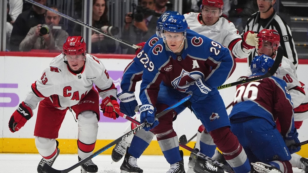 Avalanche score 5 goals in second period and end Hurricanes' 8-game win ...