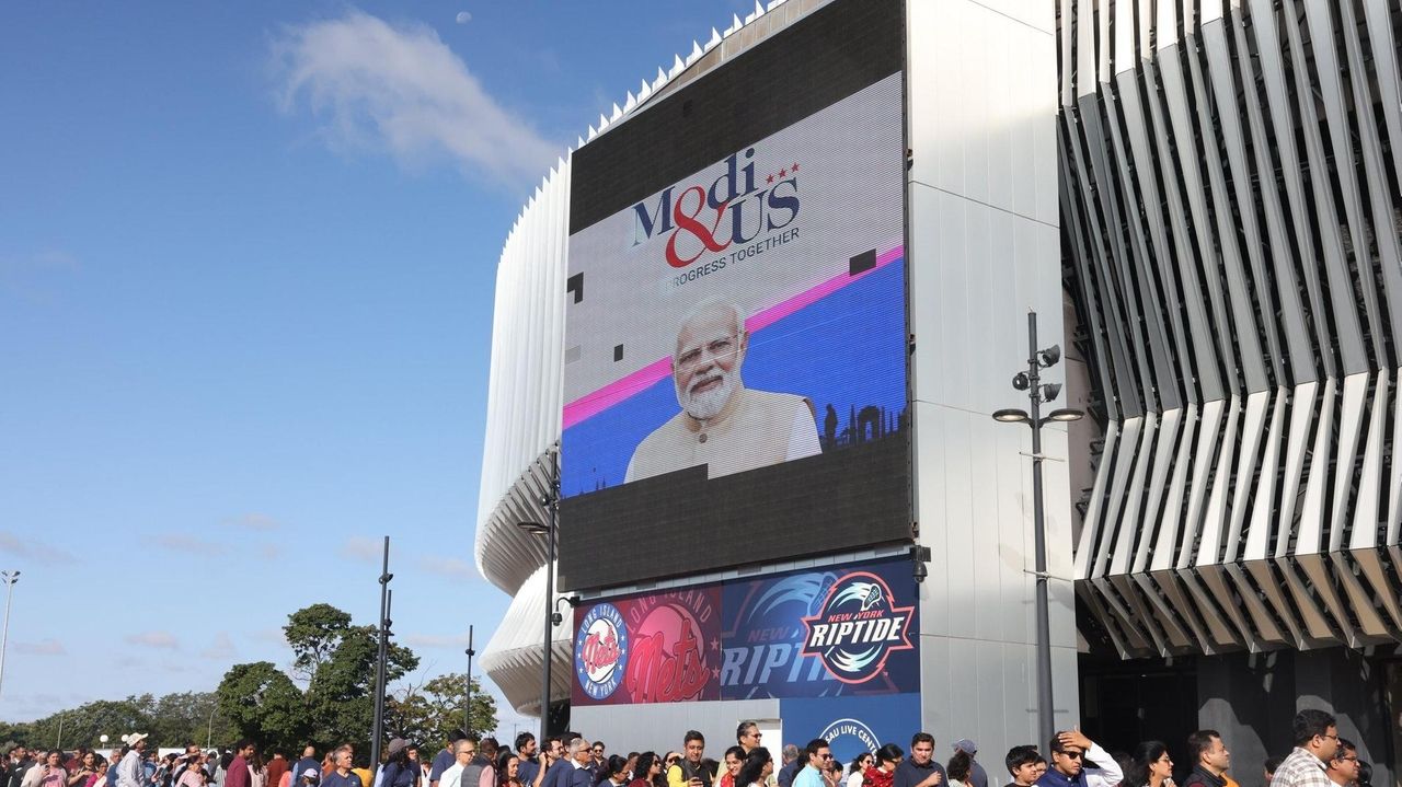 India's Prime Minister Narendra Modi speaks at Nassau Coliseum, met by ...