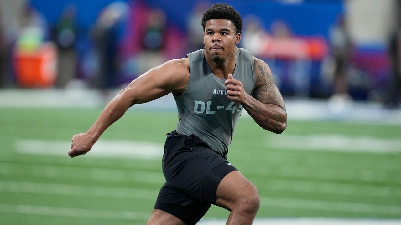 Miami Dolphins bolster pass rush, taking Chop Robinson of Penn State ...