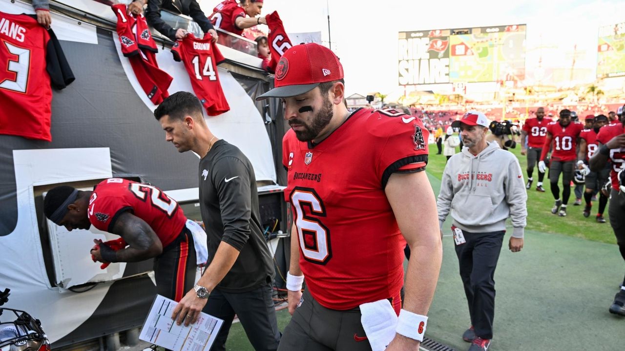 QB Mayfield hurts ribs as Bucs lose 23-13 to the Saints and waste chance to clinch title at home ...