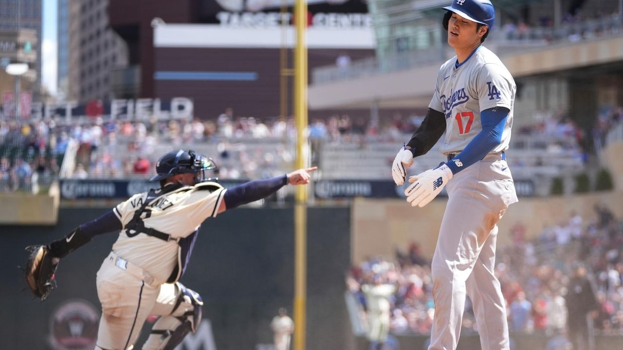 Twins stop slide on Julien's homers, Correa's throw to nab Ohtani at plate in 3-2 win over ...