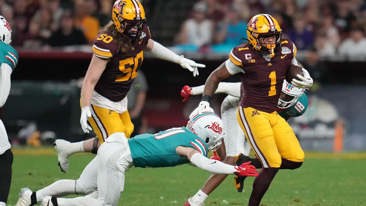 Smith's diving TD catch in overtime sends Minnesota to 20-17 win over ...