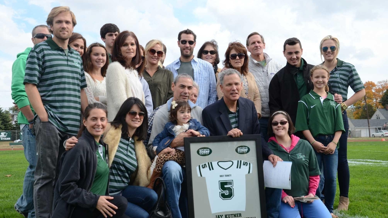 Holy Trinity retires late football player's number at homecoming - Newsday