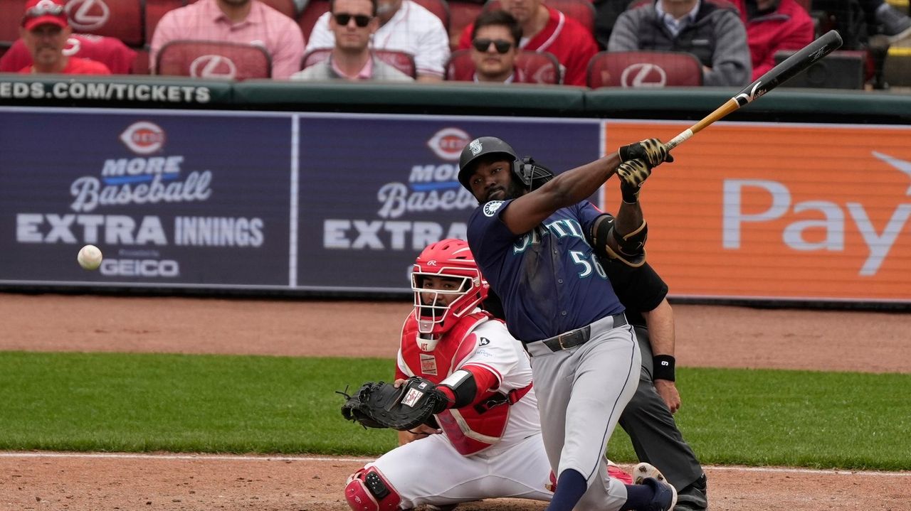 Arozarena, Mariners rally past Reds for 11-7 win in 10 innings - Newsday