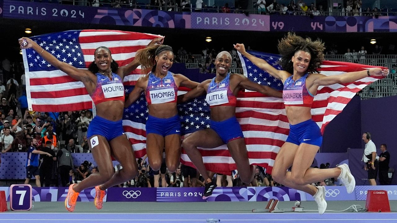American relay teams win 2 golds in the last events of a dominant ...