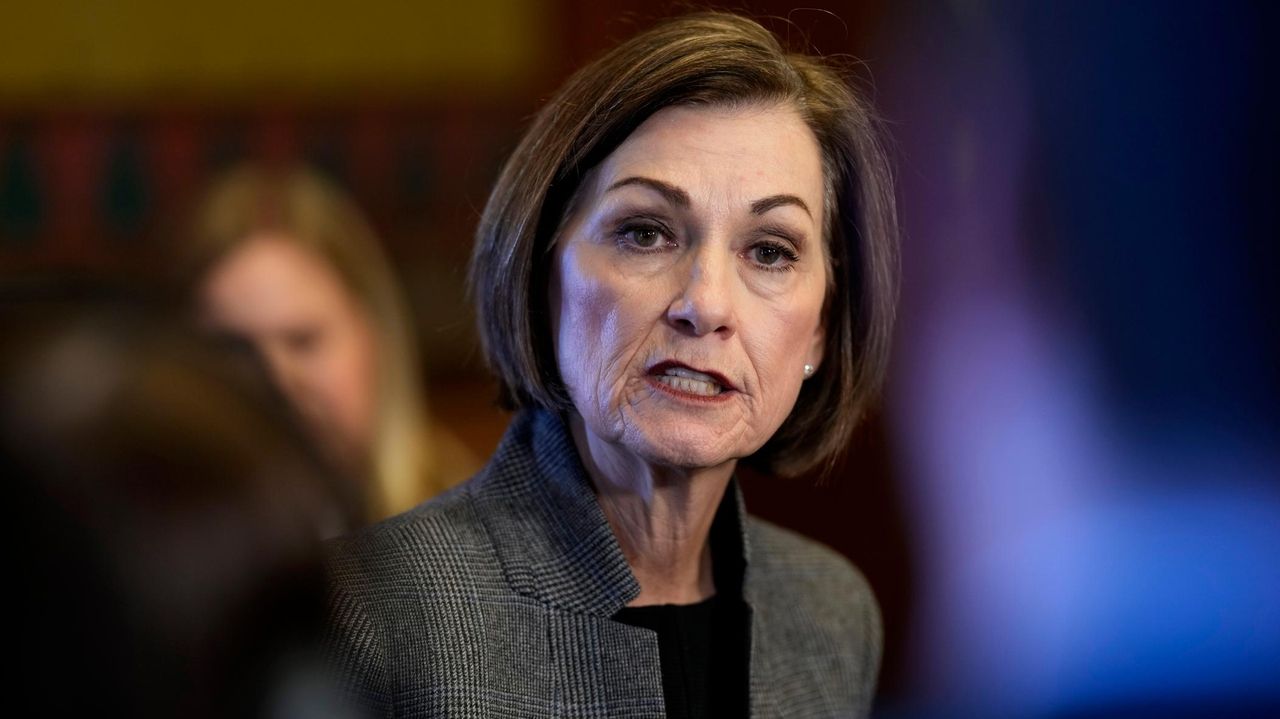 Iowa's governor signs a bill removing gender identity protections from ...