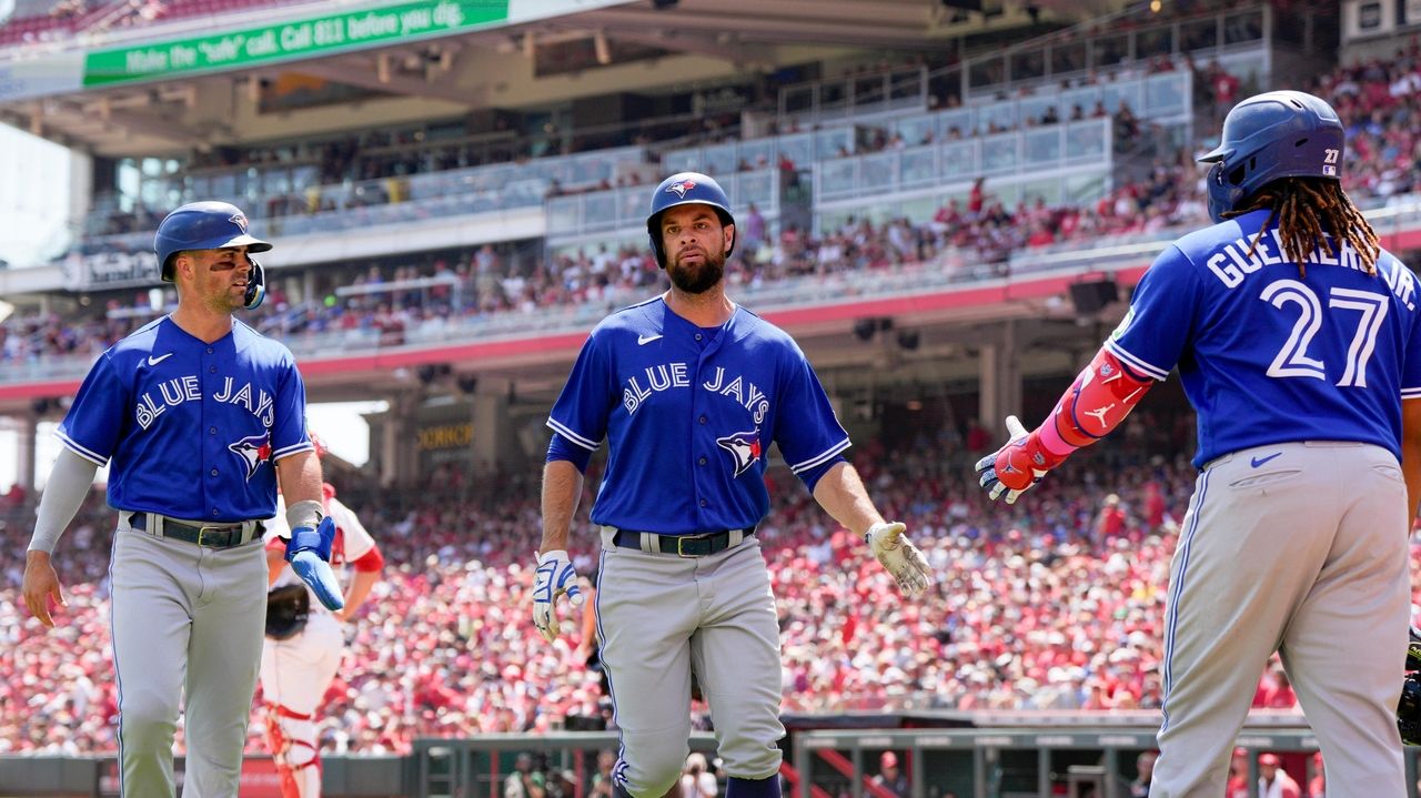 Belt hits 2 of Blue Jays' 5 home runs off Hunter Greene in 10-3 rout of ...