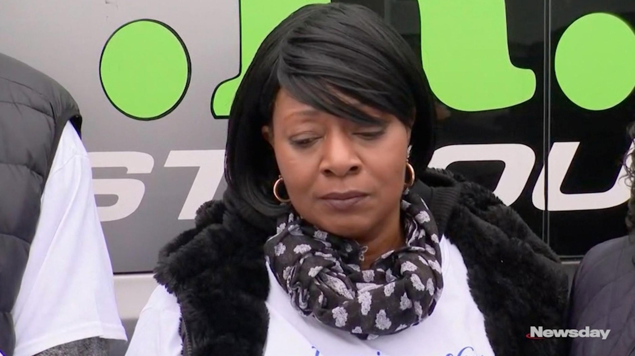 Community leaders hold vigil, call for action in unsolved murder - Newsday