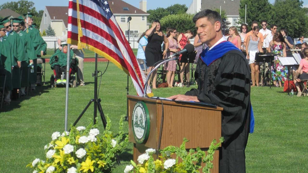 Harborfields principal wears many caps during graduation - Newsday