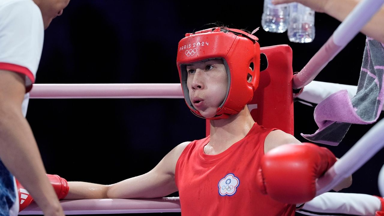 Boxer Lin Yu-ting of Taiwan wins her opening bout at the Paris Olympics ...