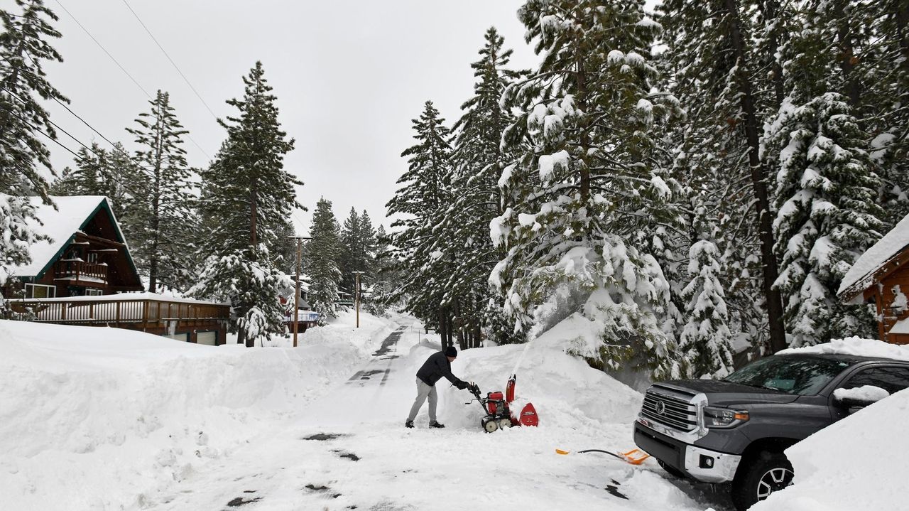 California ski resort workers tunnel their way into the office after ...