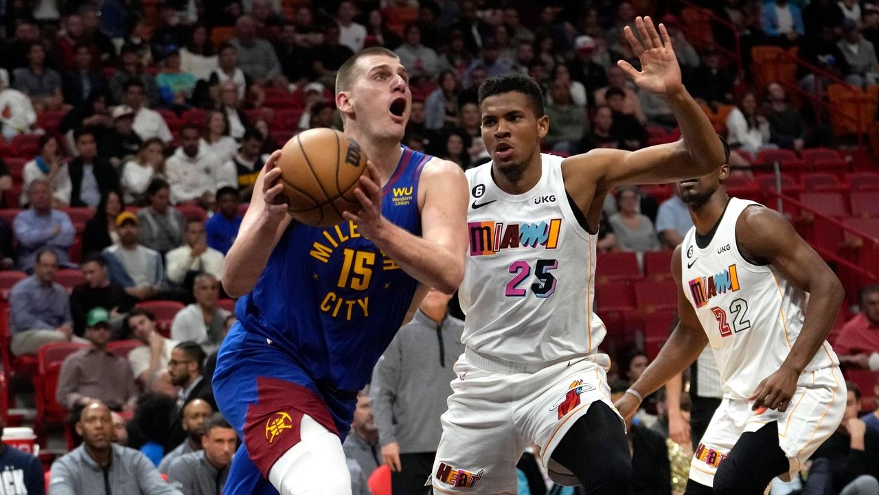 Nikola Jokic scores 27, Nuggets hold off Heat - Newsday