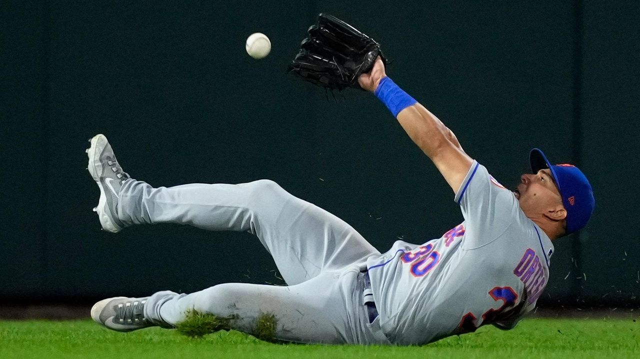 Mets officially eliminated from playoff contention with 10-inning loss ...