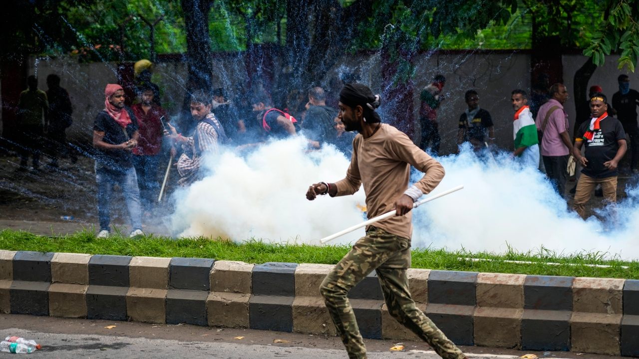 Indian police fire tear gas and water cannons at rally against rape and ...